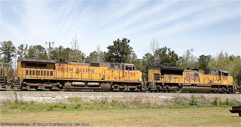 UP SD70ACe 8312 leads C44-9W 9780, CSX C40-8W 7679, and C40-8 7626